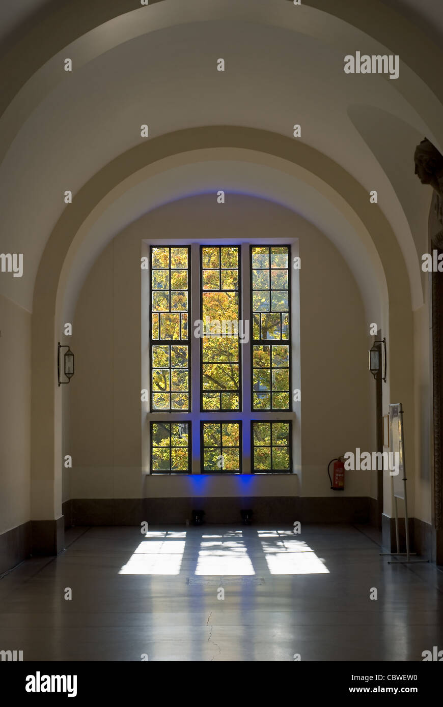 Interior with Vaulted Hall and Autumn Window View Stock Photo - Alamy