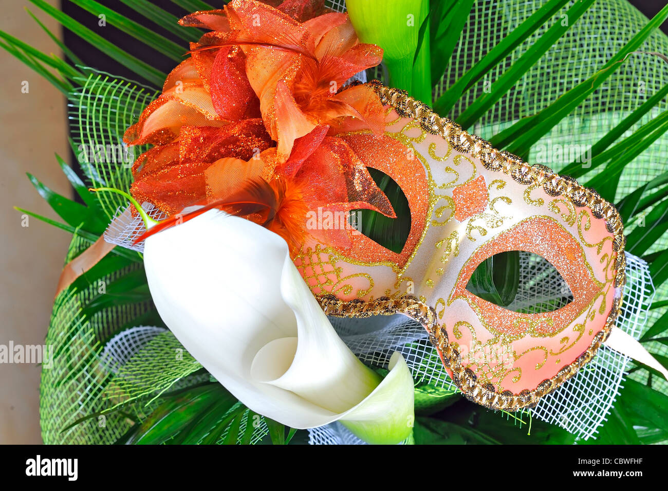 Venetian mask and flowers Stock Photo - Alamy