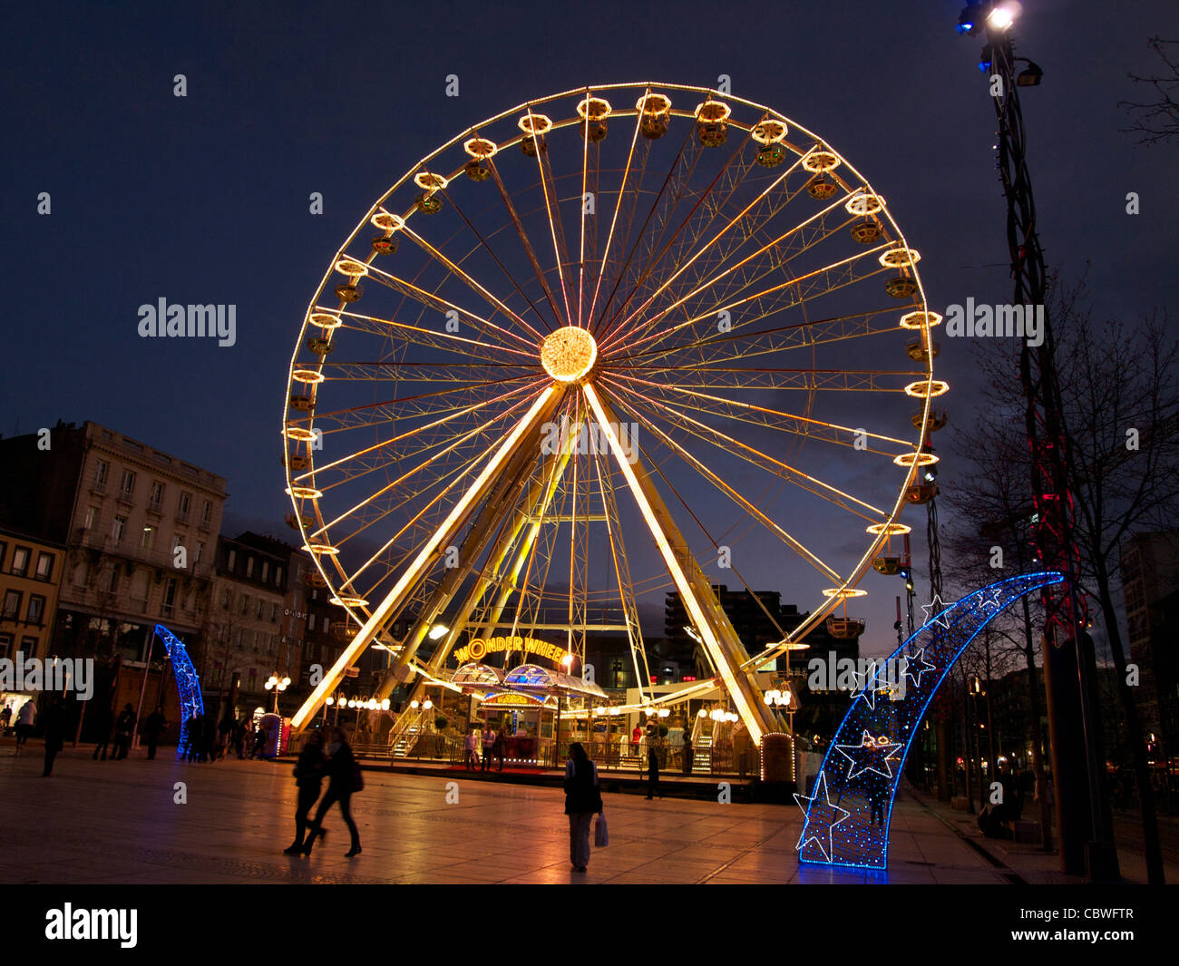 Ferris wheel at a traveling funfair in Clermont-Ferrand, France, Europe ...