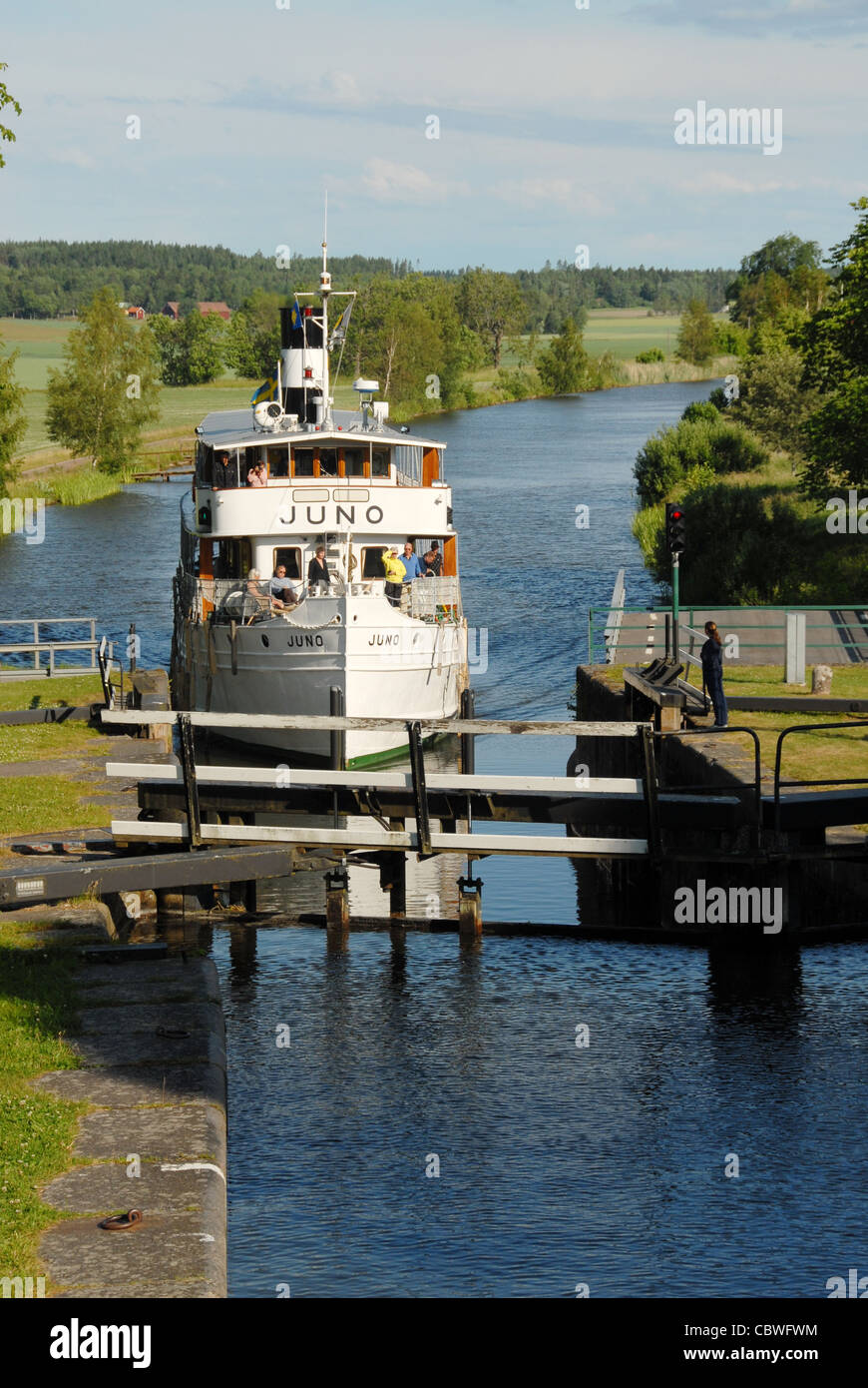 The historic steamer MS Juno cruising on Göta Kanal and approaching the ...