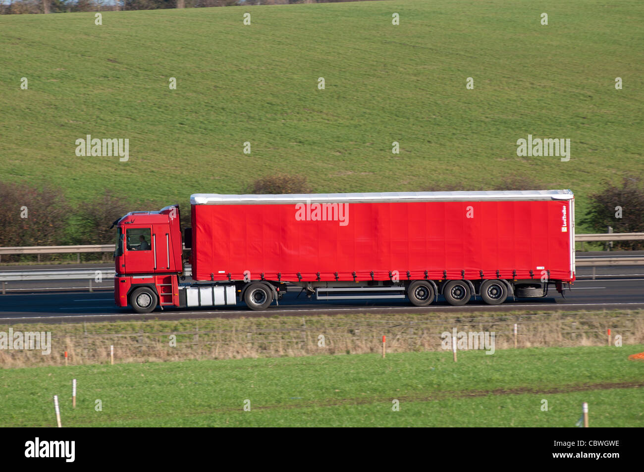 Red lorries hi-res stock photography and images - Alamy