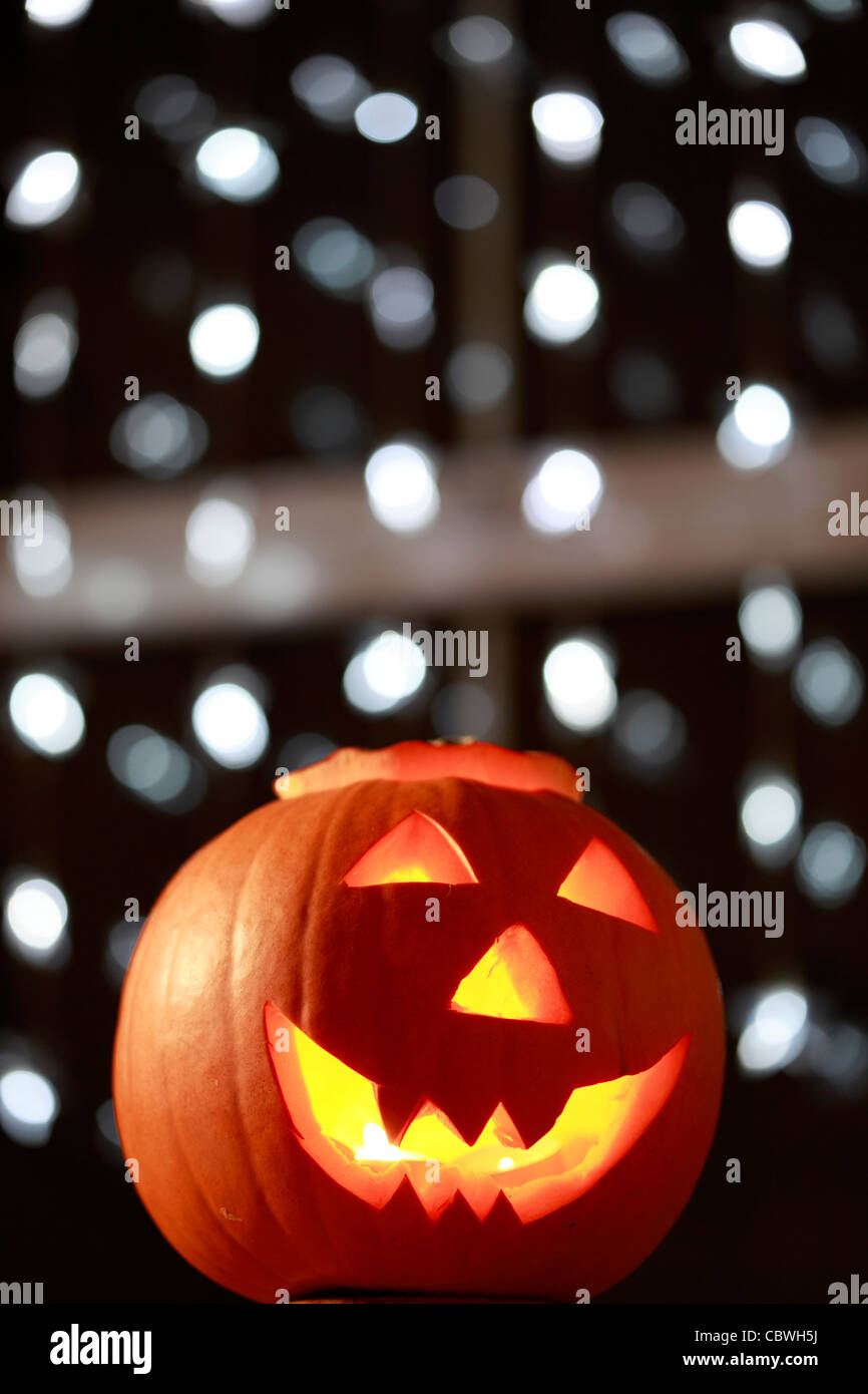hand cut Halloween pumpkin with triangle eyes and teeth and candle ...