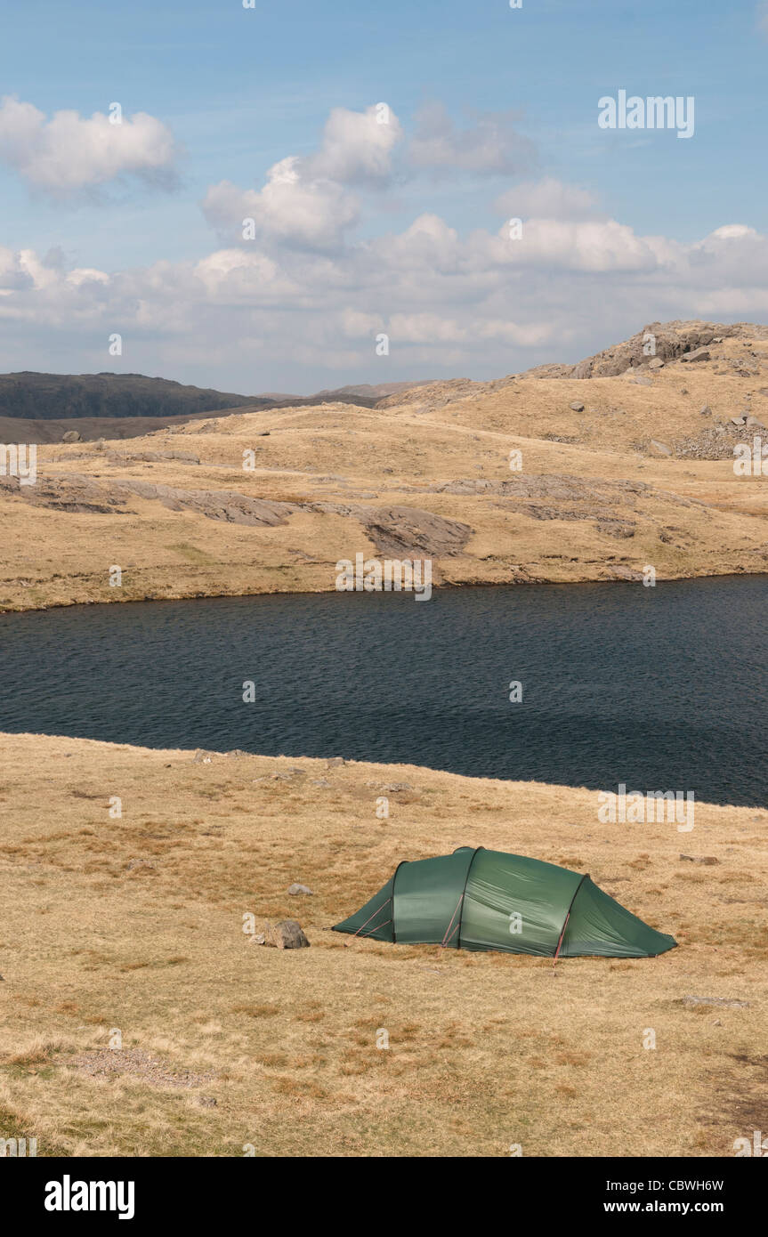 Tent by tarn Stock Photo - Alamy