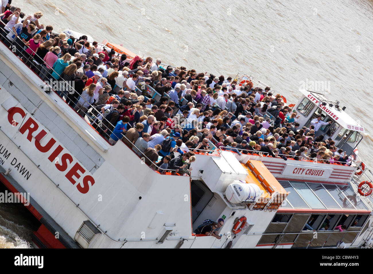 Crowded river cruise boat on the Thames Stock Photo - Alamy