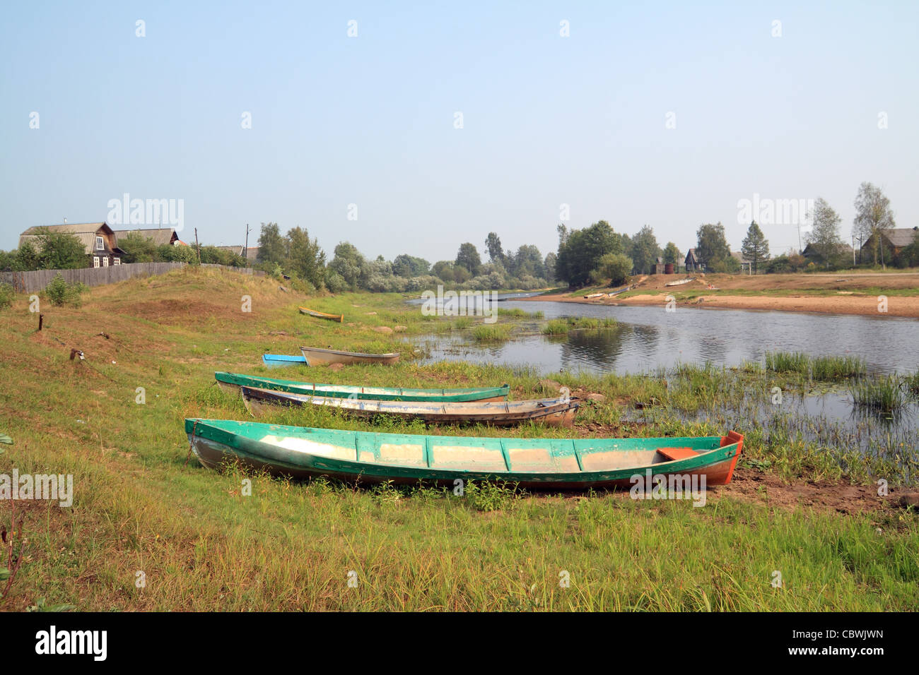 small boats on coast river Stock Photo - Alamy