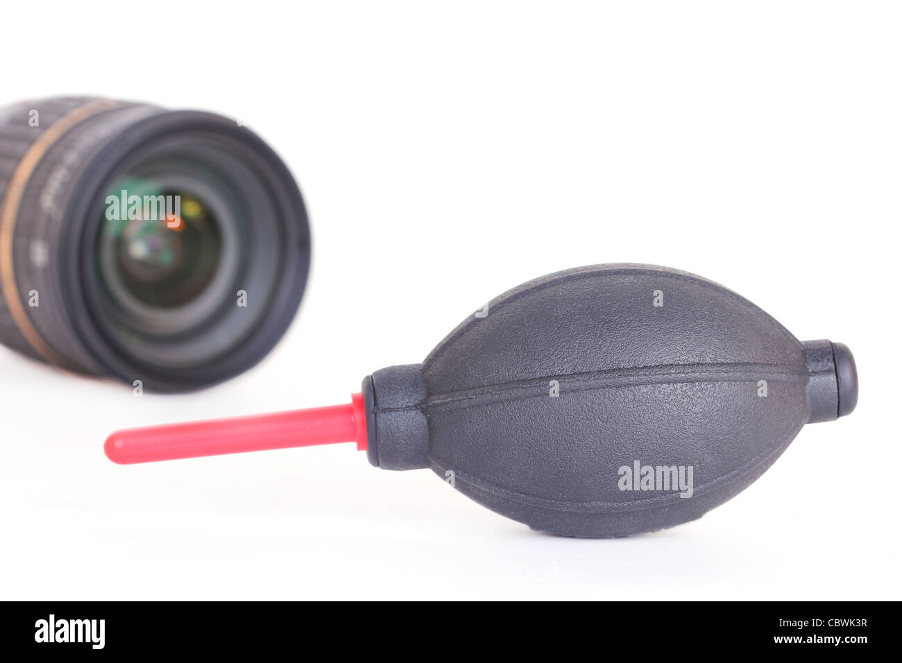 Optics cleaning tools and lens, closeup on white background Stock Photo ...