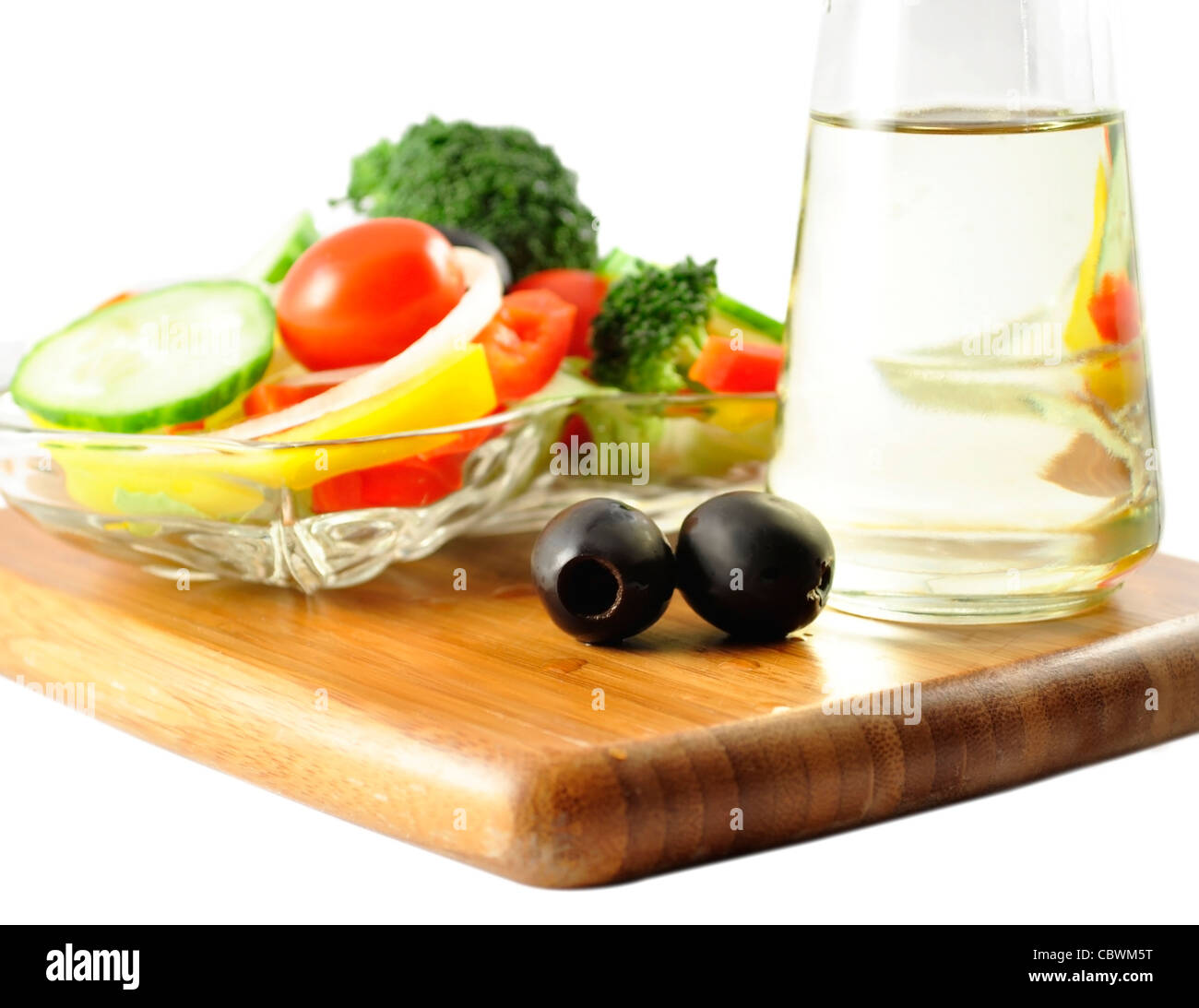 a fresh vegetable salad and cooking oil Stock Photo - Alamy