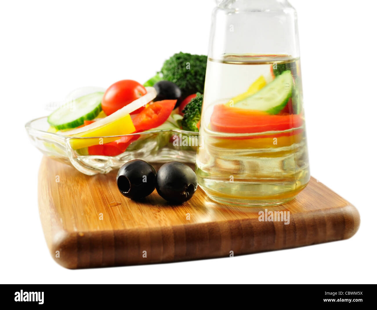 a fresh vegetable salad and cooking oil Stock Photo - Alamy