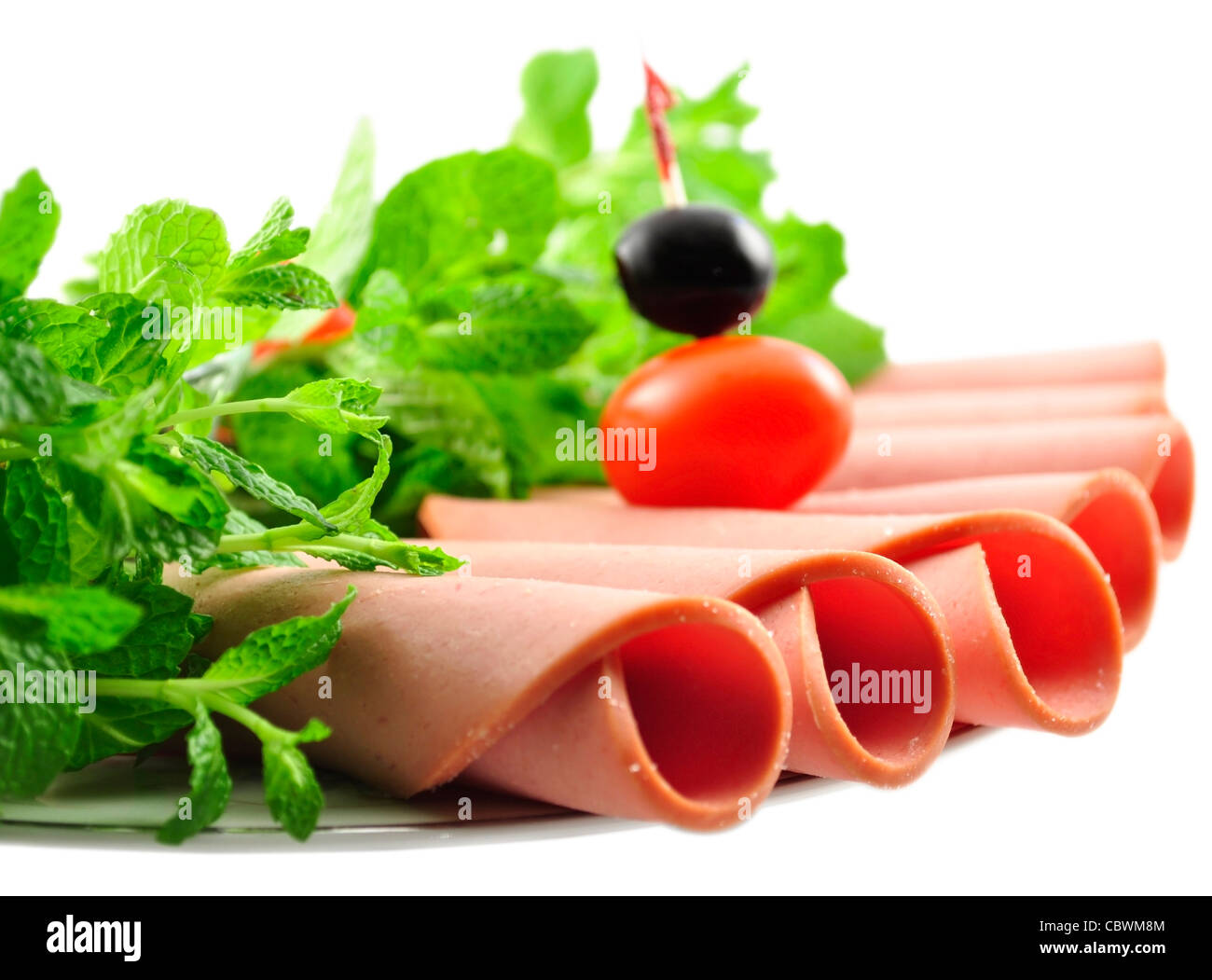sliced food arrangement with some vegetables Stock Photo - Alamy