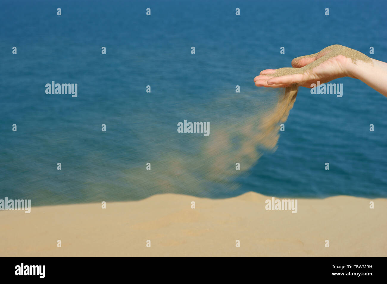sand in female hand Stock Photo - Alamy