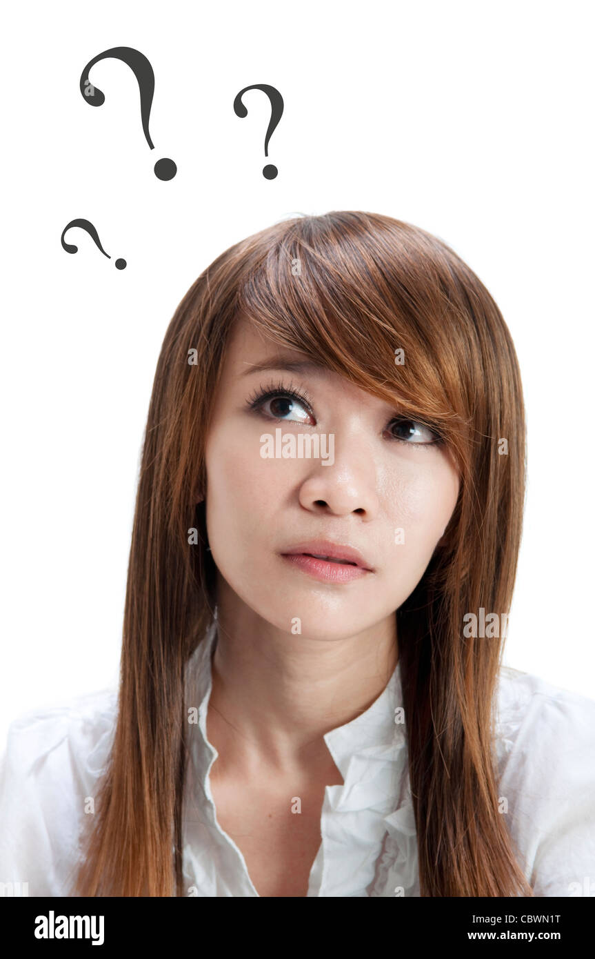 Wondering Asian girl on white background Stock Photo - Alamy