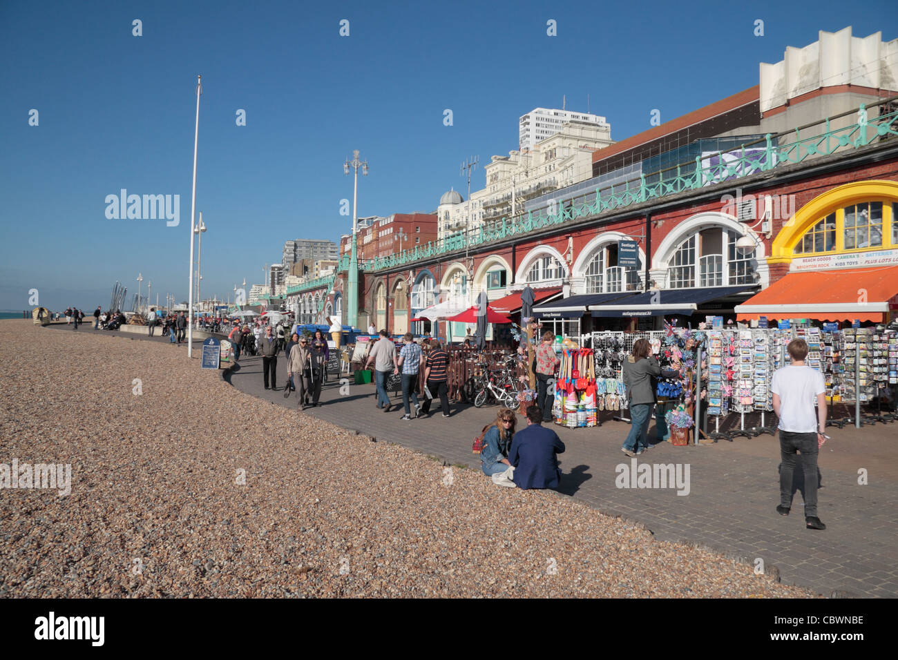 Lines of seaside stalls and shops on the beach front along Brighton ...