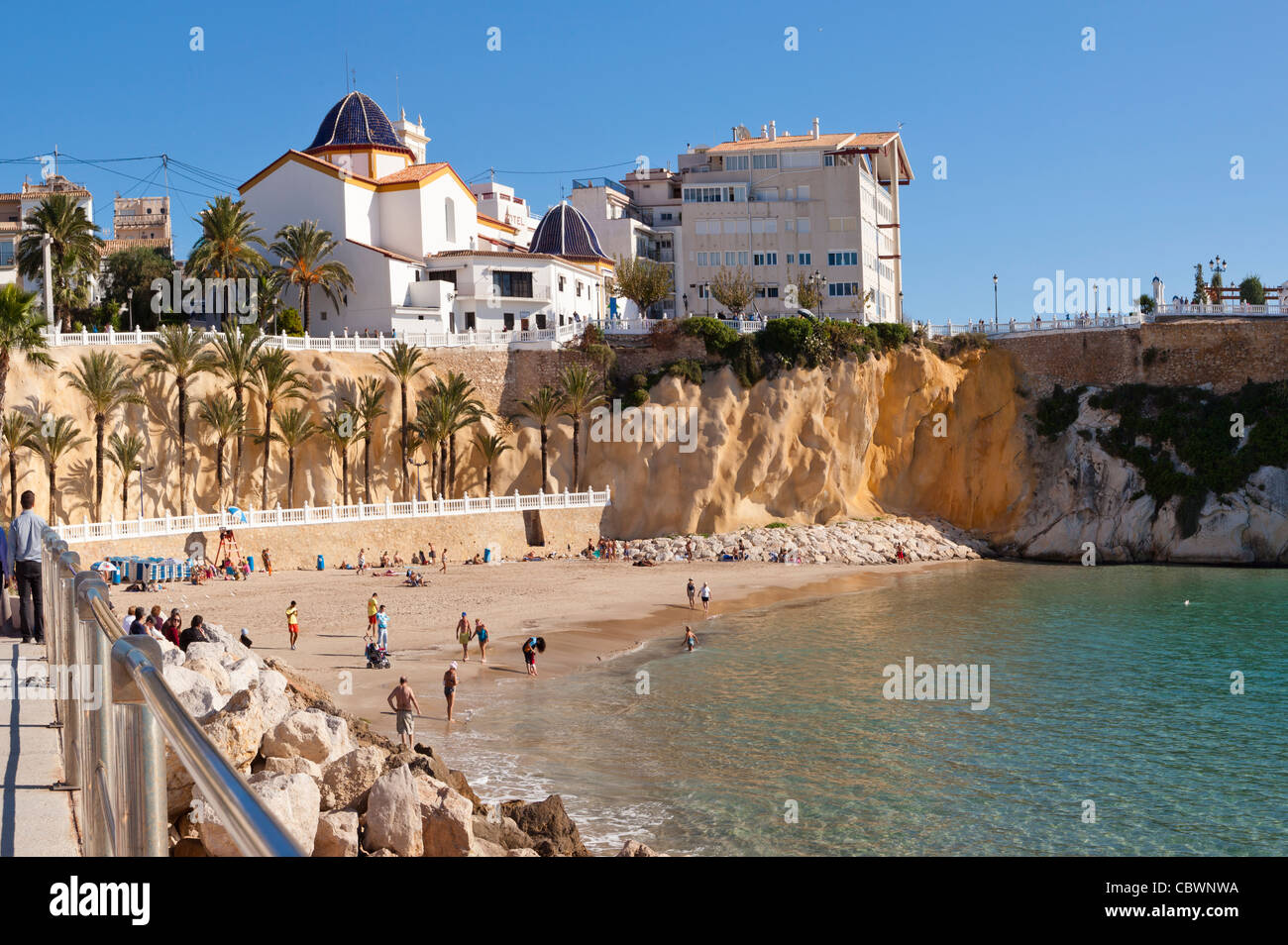 view of Benidorm's Mal Pas Beach, castle headland and old church Stock ...