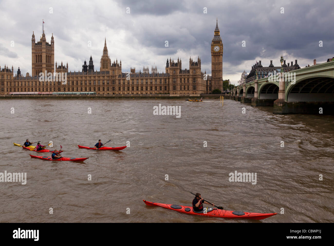 Canoeing on the River Thames with the Big Ben and Houses of Parliament ...