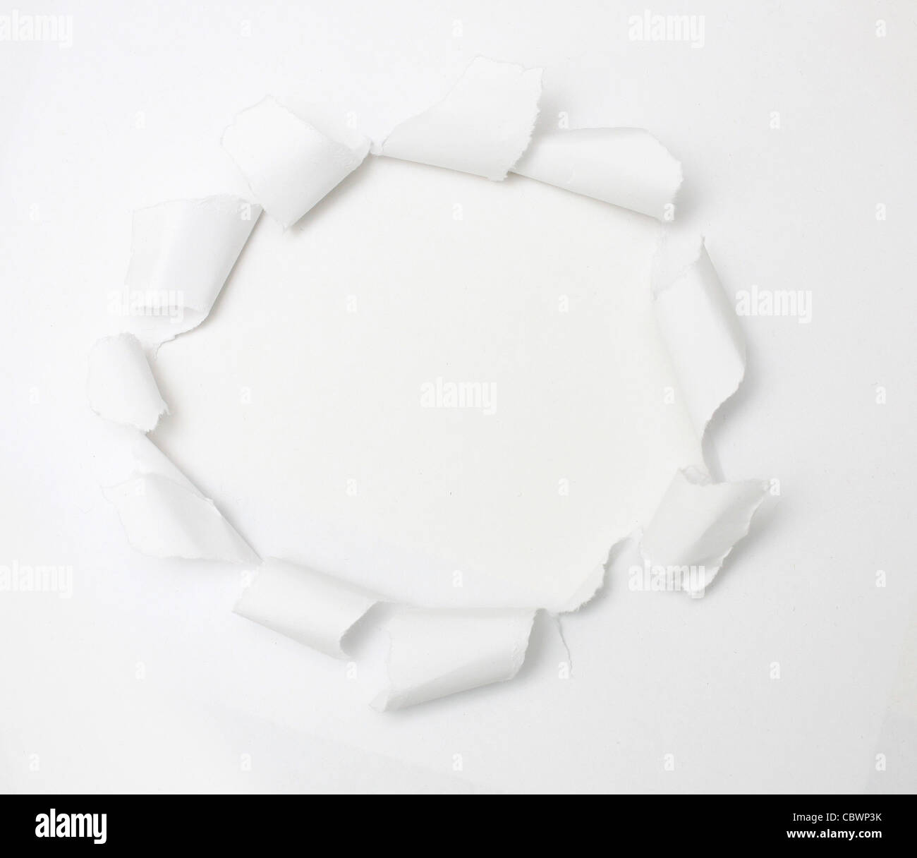 Hole in paper Stock Photo - Alamy