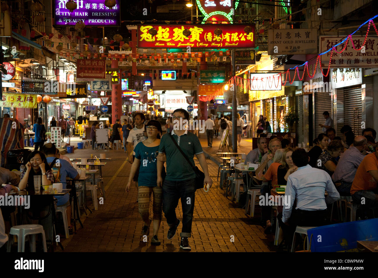 The neon lights and busy street of Temple Street Kowloon, Hong Kong ...