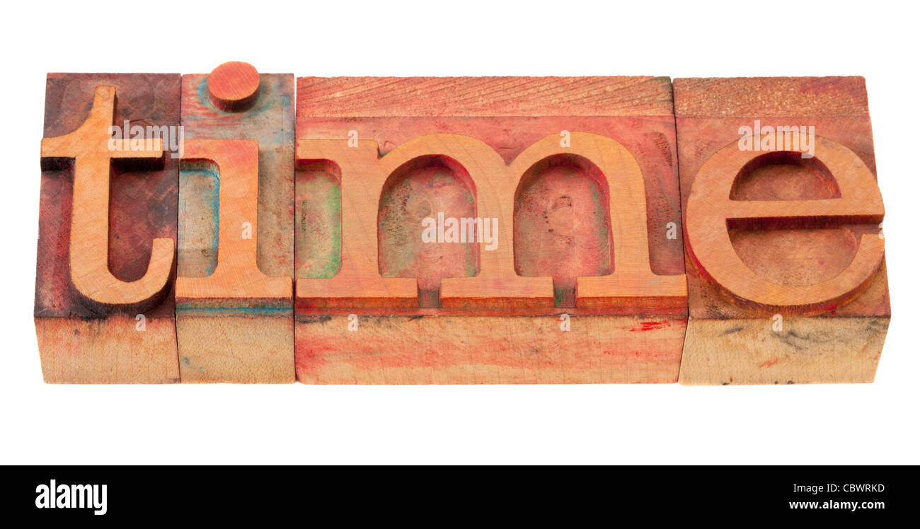 time - word in vintage wooden letterpress printing blocks, stained by ...