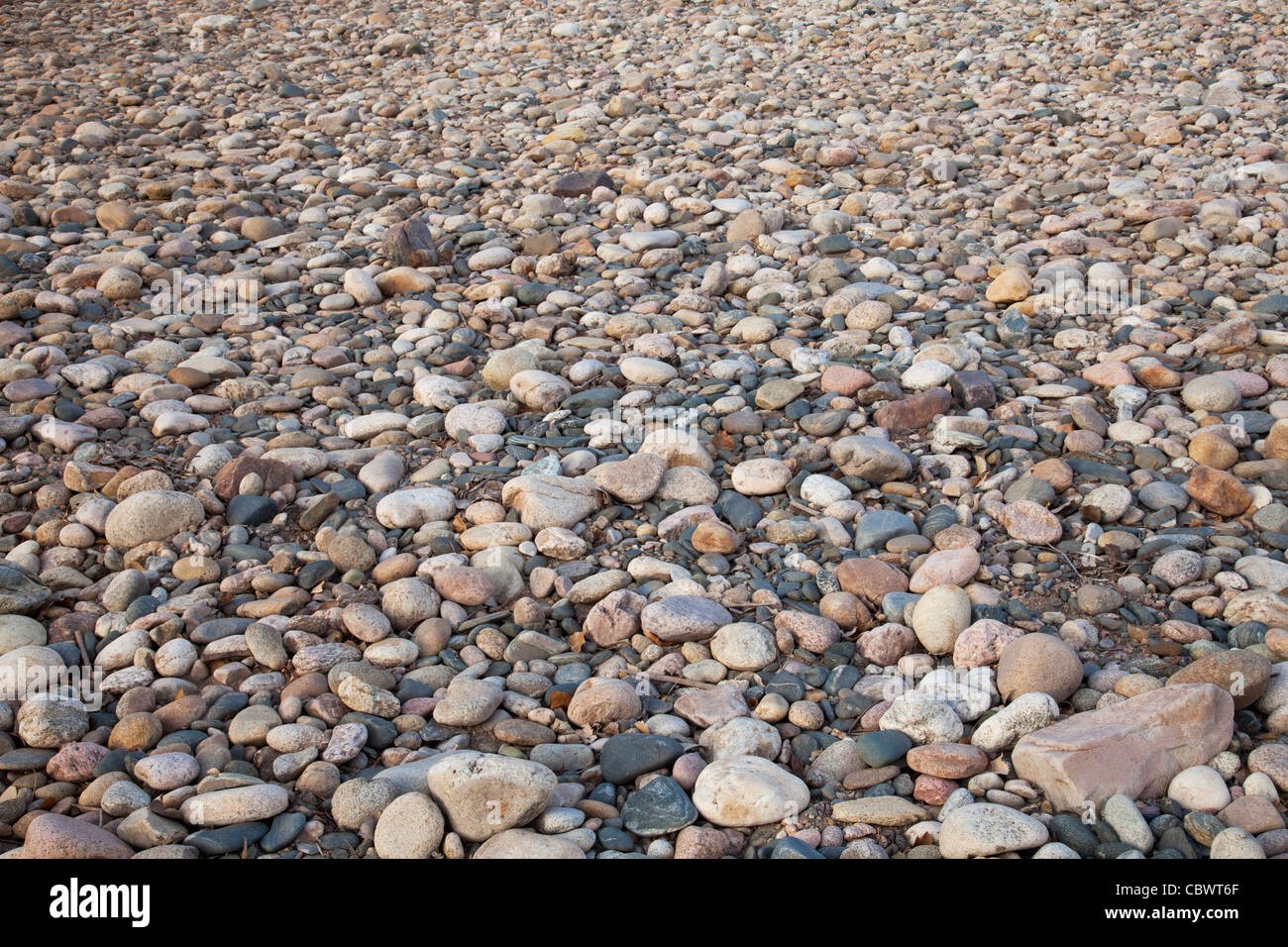 large field of pebbles and rocks - a dry bed of mountain river Stock ...