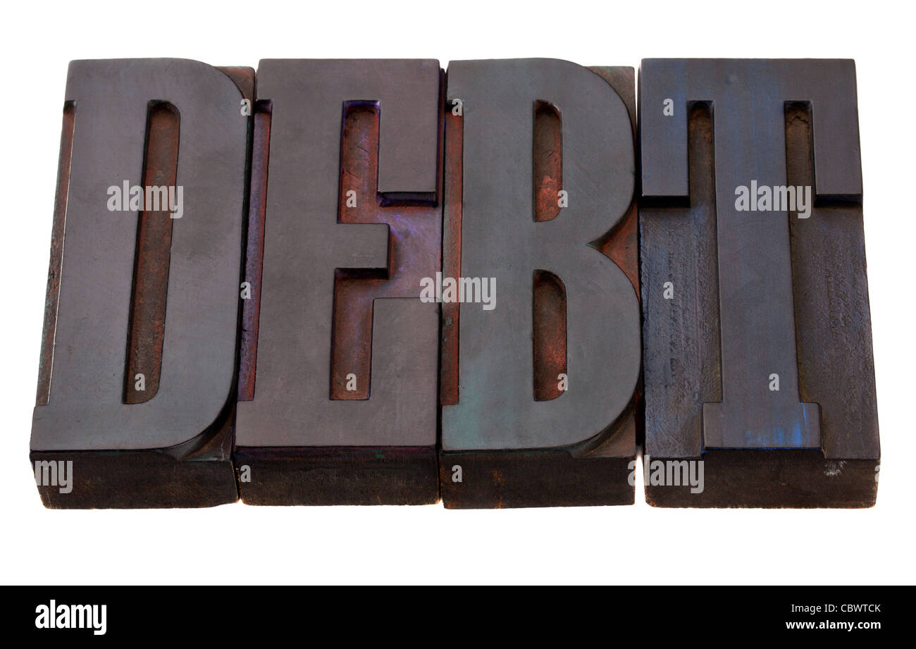debt word in vintage wooden letterpress printing blocks, stained by ...