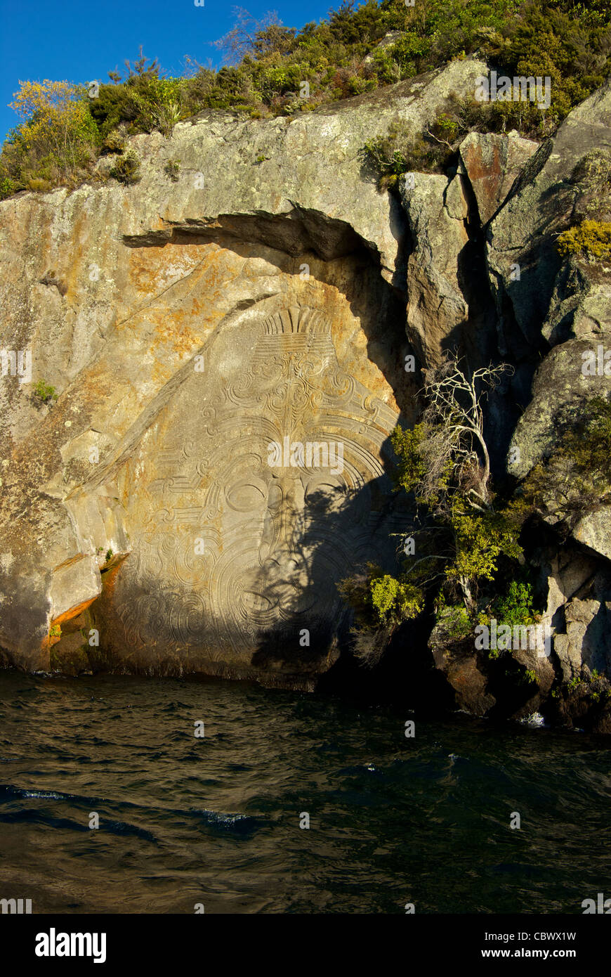 Modern Maori rock carvings depicting God of Volcanoes Great Lake Taupo ...