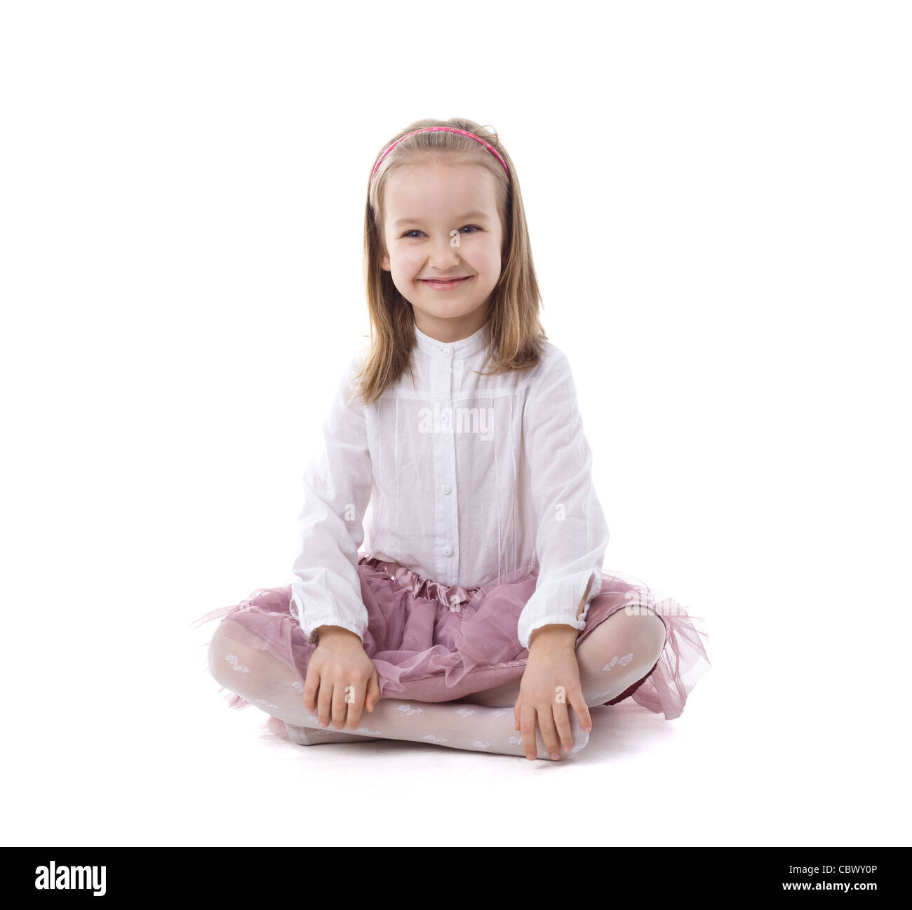 Child legs crossed Cut Out Stock Images & Pictures - Alamy