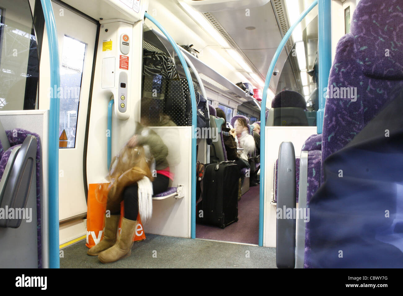 people travelling on northern rail train Stock Photo - Alamy