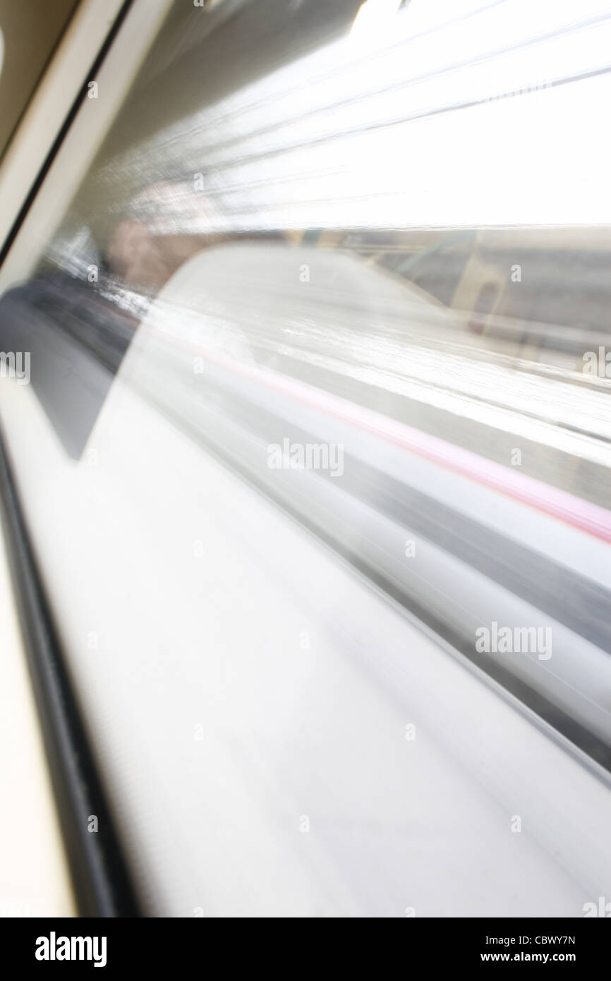 trains moving through train window Stock Photo - Alamy