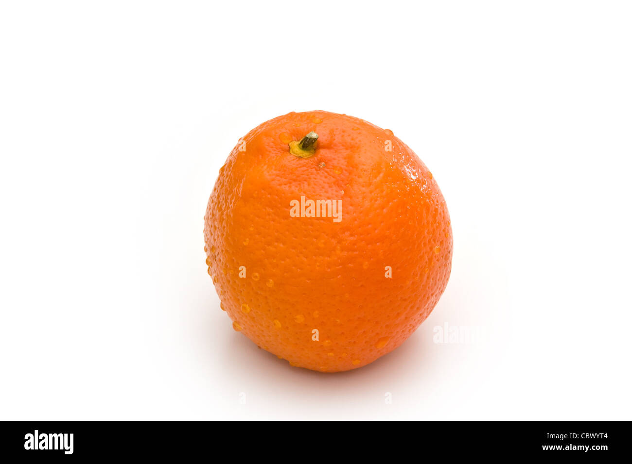 Picture of an orange isolated on white Stock Photo - Alamy