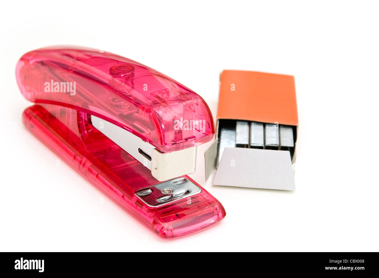 Pink stapler isolated on white Stock Photo - Alamy