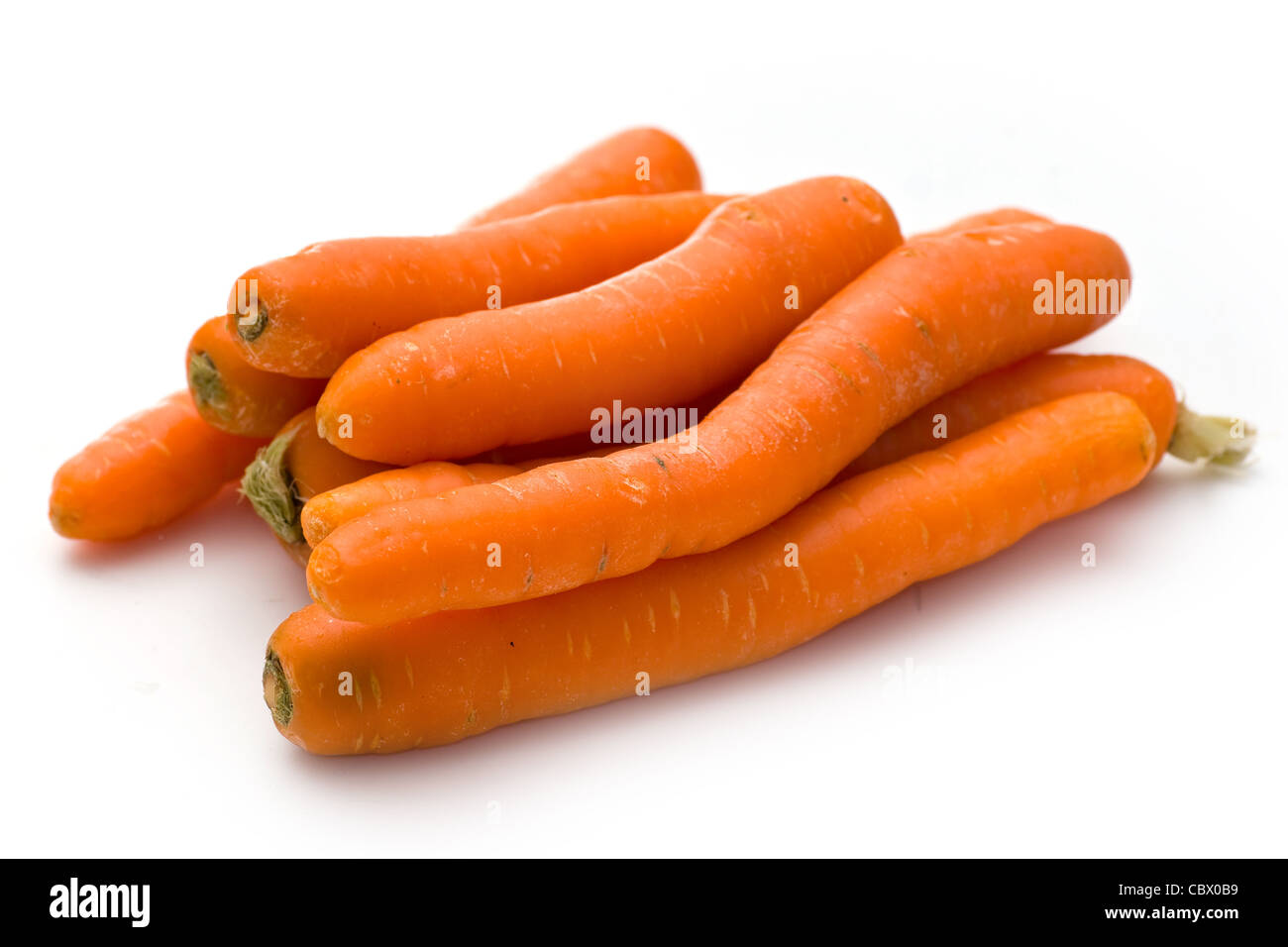 Carrots isolated on white Stock Photo - Alamy