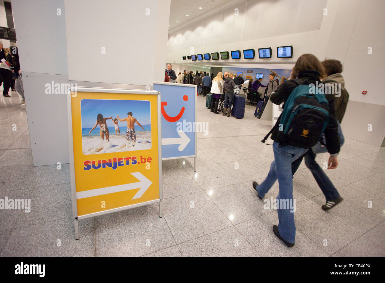 Check in desks of Jetairfly in Brussels Airport Stock Photo - Alamy