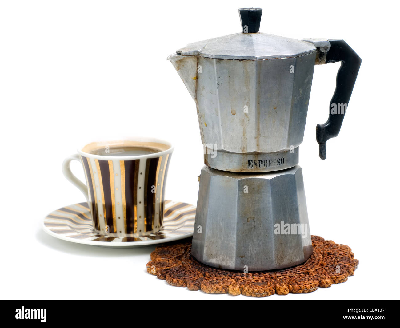 Cup full of black coffee and coffee cooker on a white background Stock ...