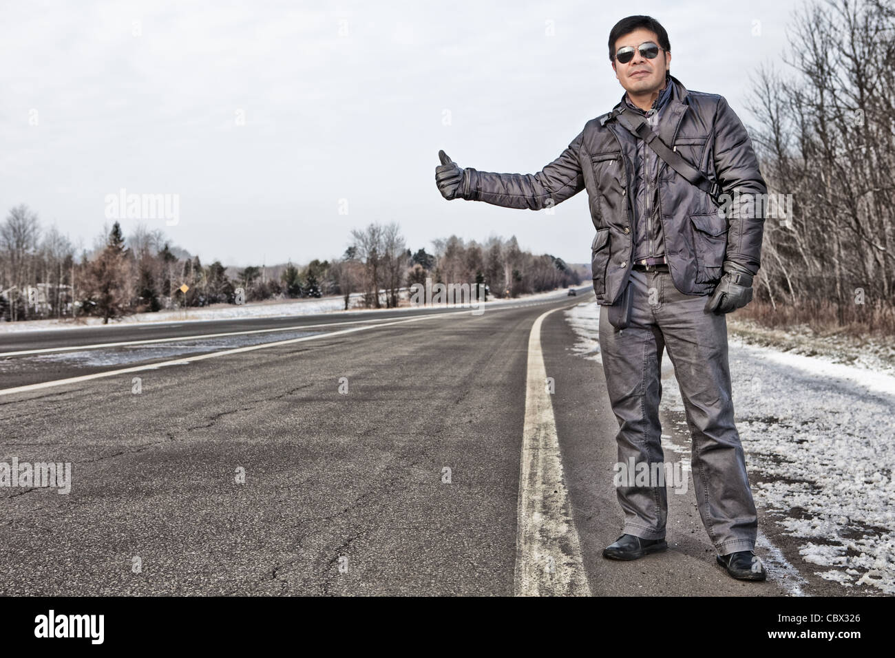 Hitchhiking thumb hi-res stock photography and images - Alamy