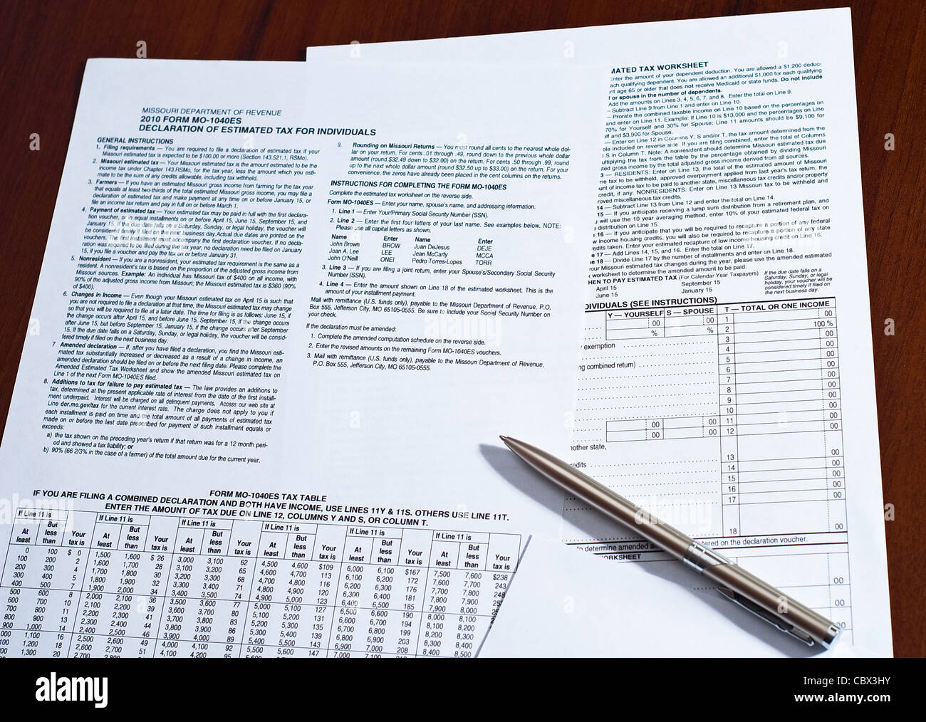 Businessman filling out form desk hi-res stock photography and images ...