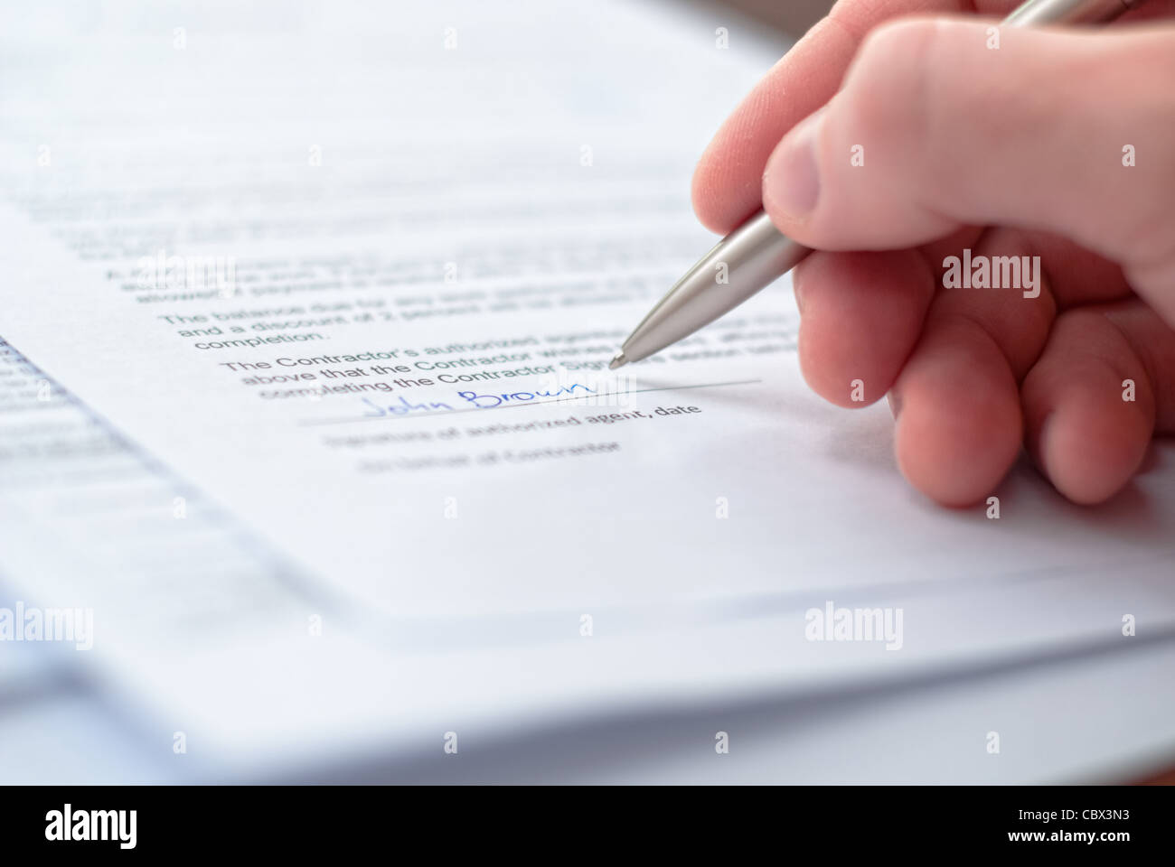 Businessman filling out form desk hi-res stock photography and images ...