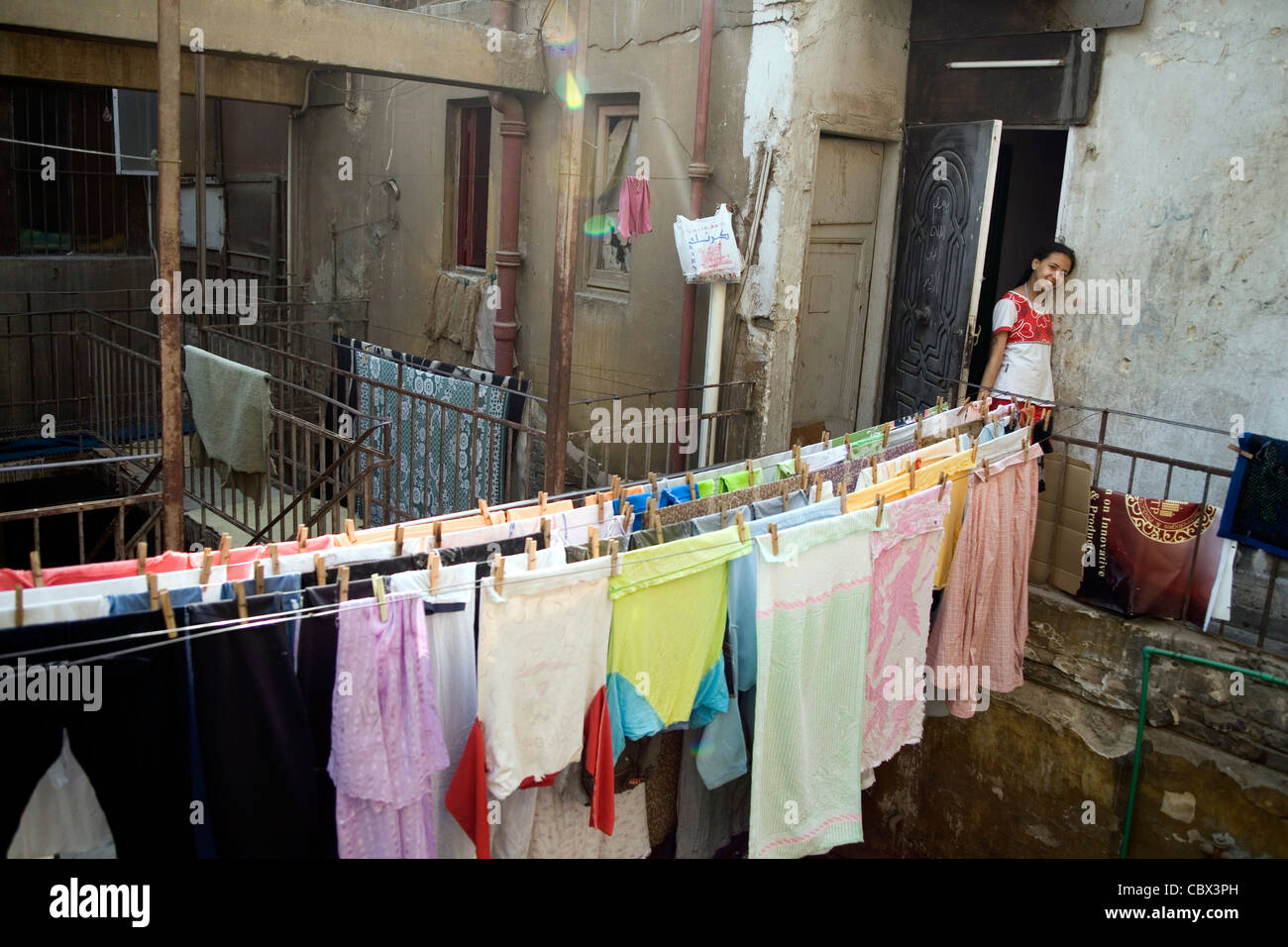 Little girl in front of her home door Il Cairo Egypt Stock Photo - Alamy