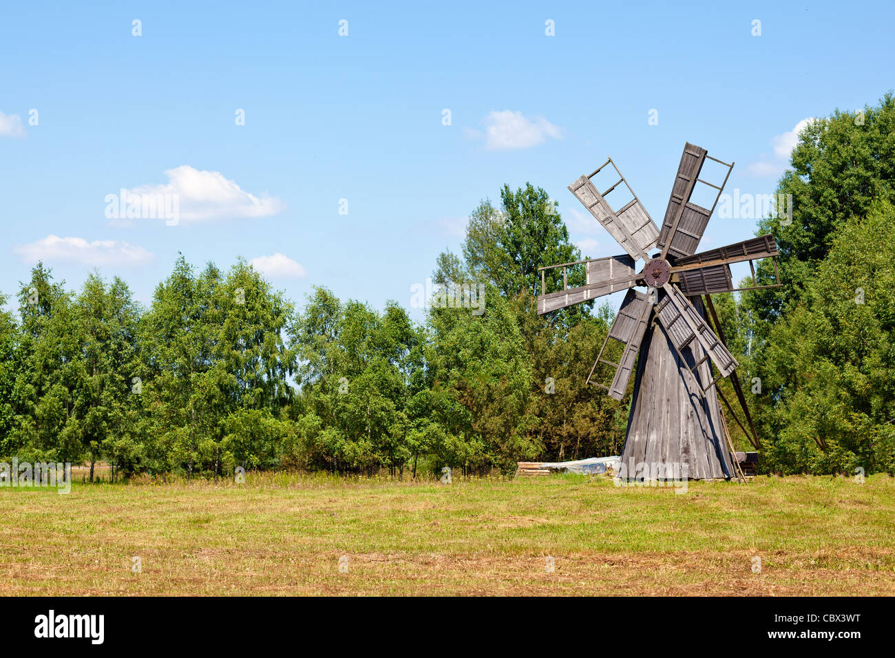Summer Landscape with Ancient windmill Stock Photo - Alamy