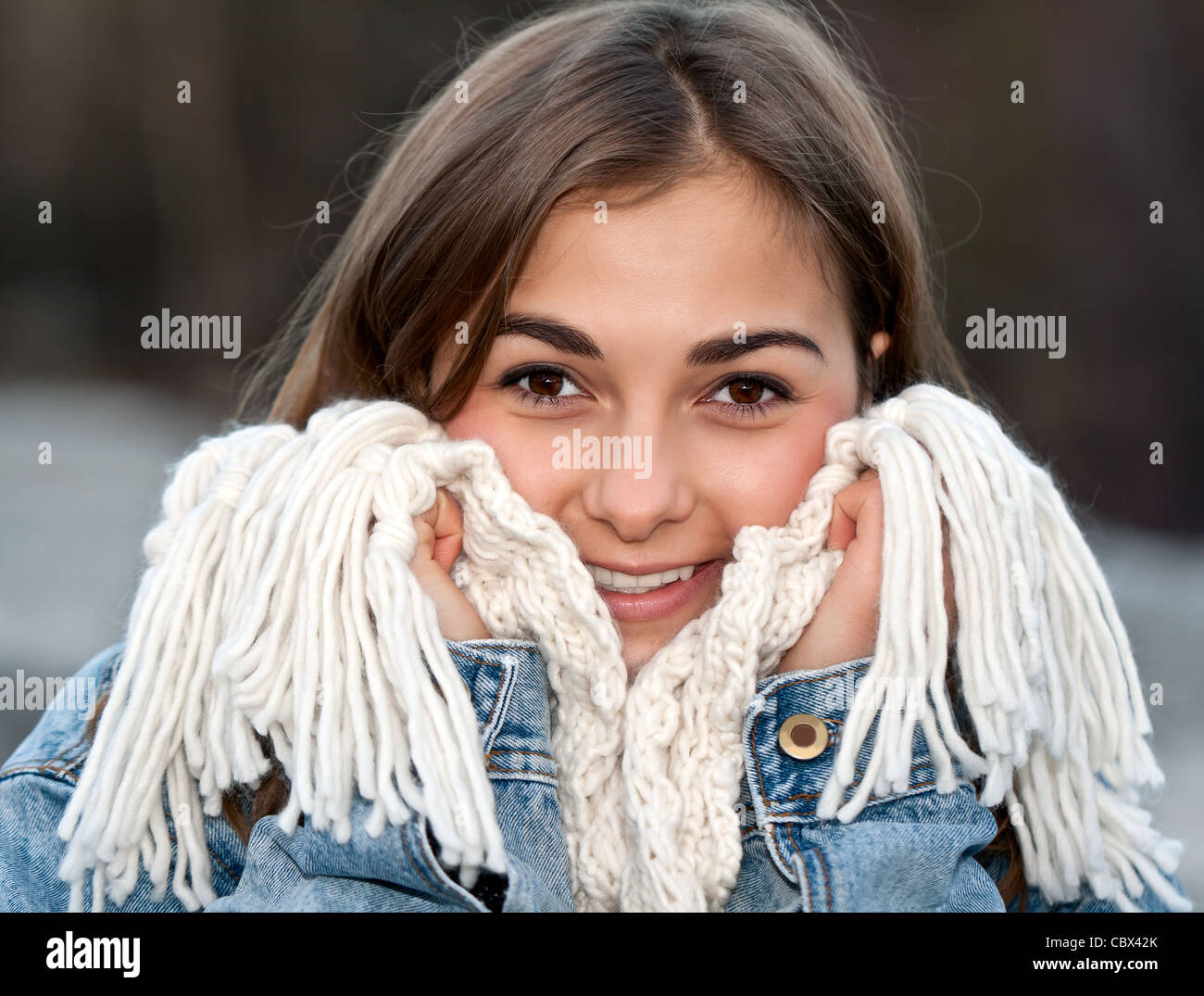 portrait of a girl wrapped in a warm scarf Stock Photo - Alamy