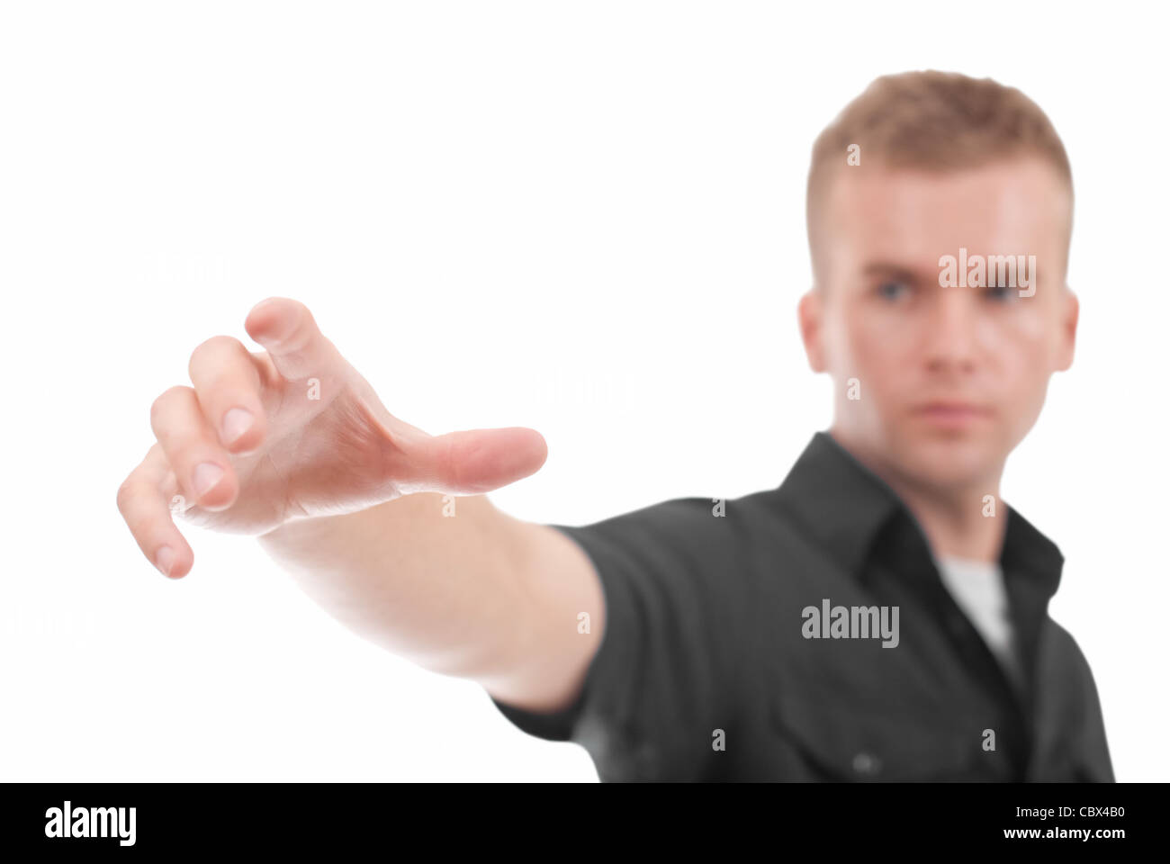 Male model holding something Stock Photo - Alamy