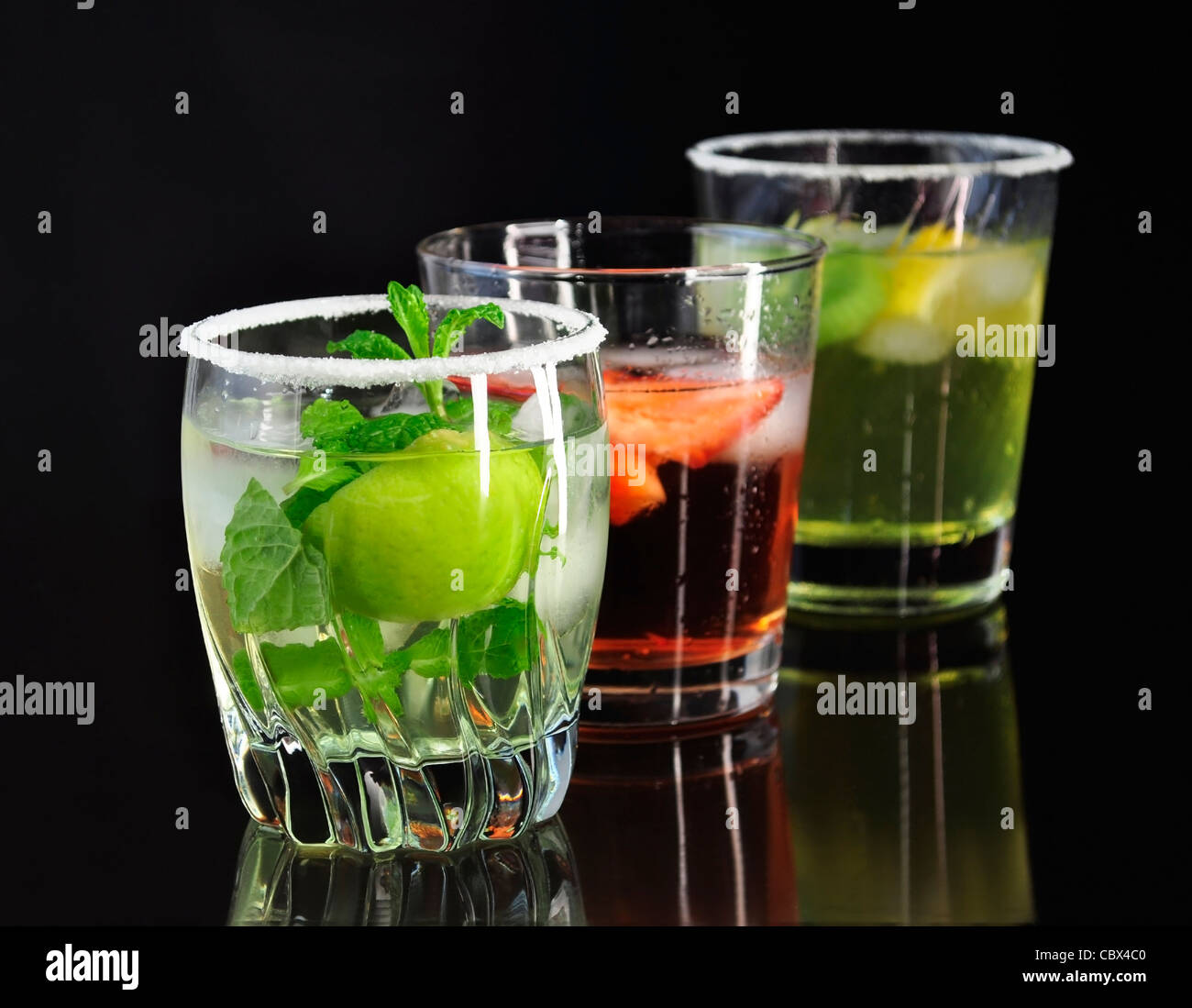 colorful fruit cocktails with ice cubes Stock Photo - Alamy