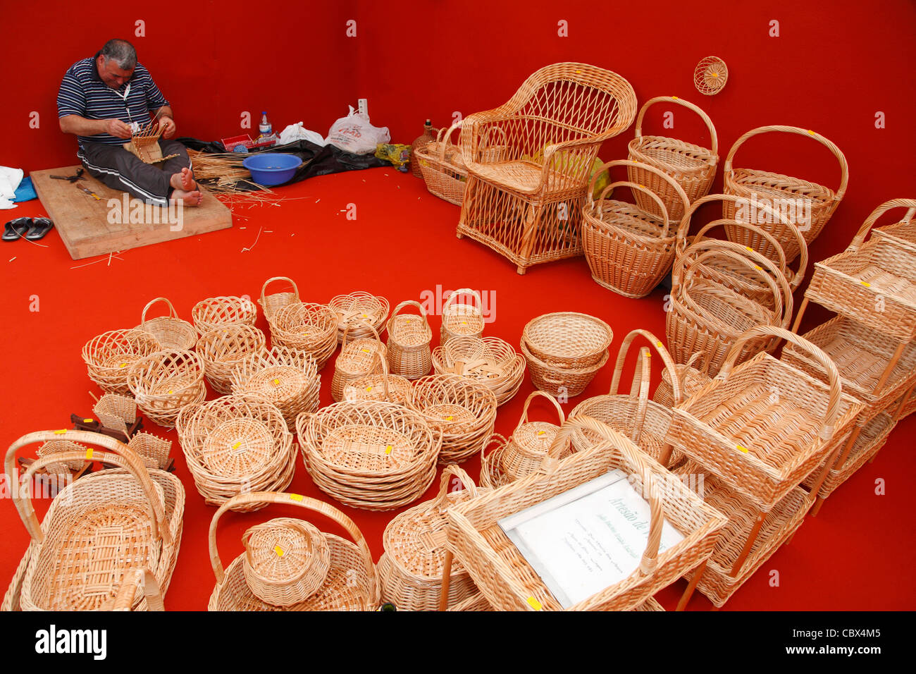 Azorean craftsman surround by his works Stock Photo - Alamy