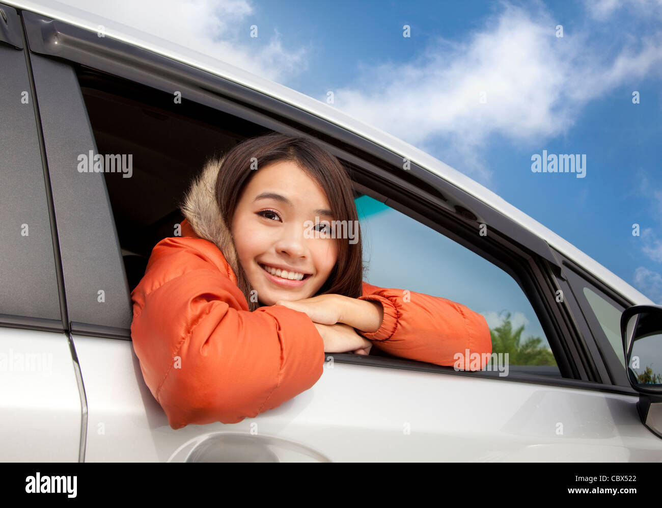 happy young asian woman in the car Stock Photo - Alamy
