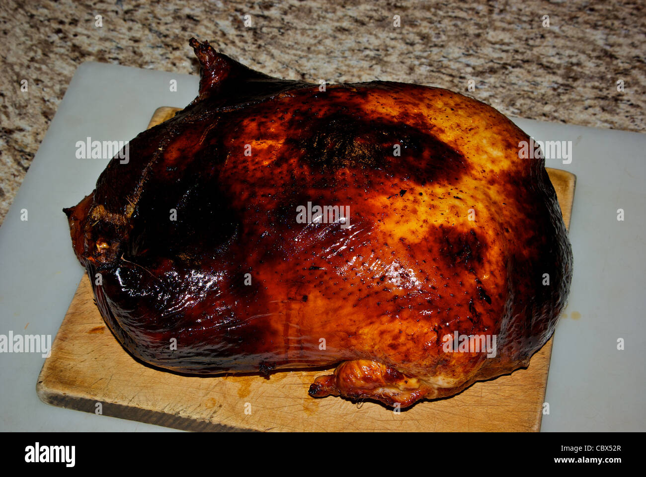 Roasted stuffed turkey completely deboned including leg bones stuffed ...