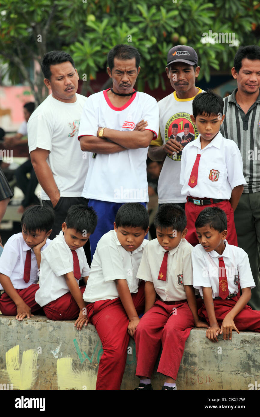 Local people at Teluk Meranti village on the banks of the Kampar river ...