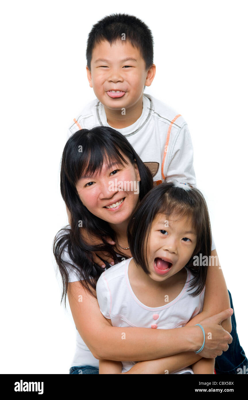 Asian mother and children on white background Stock Photo - Alamy