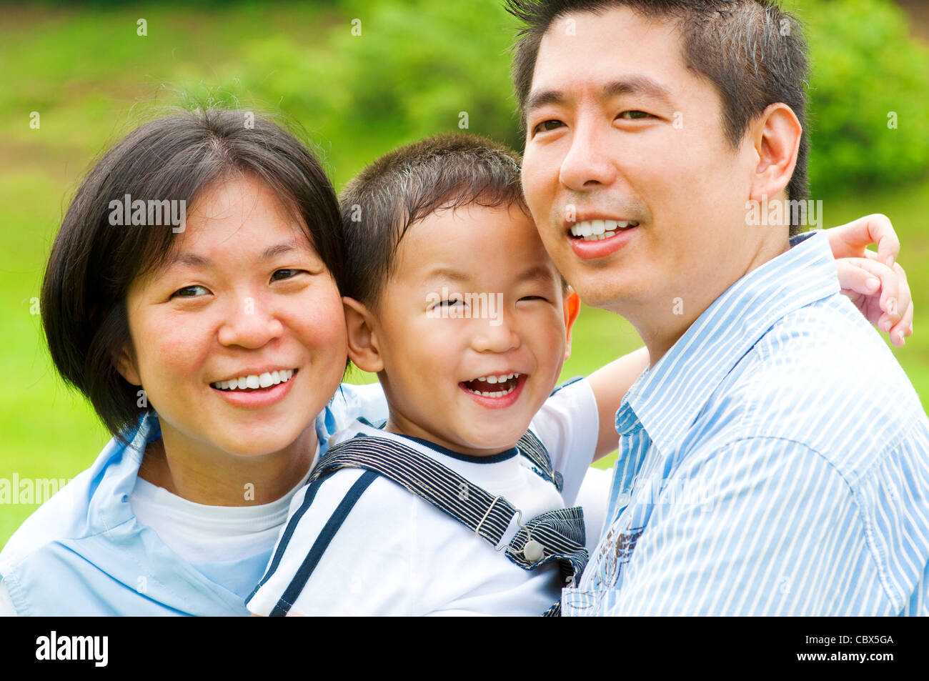 Happy Asian family at outdoors Stock Photo - Alamy