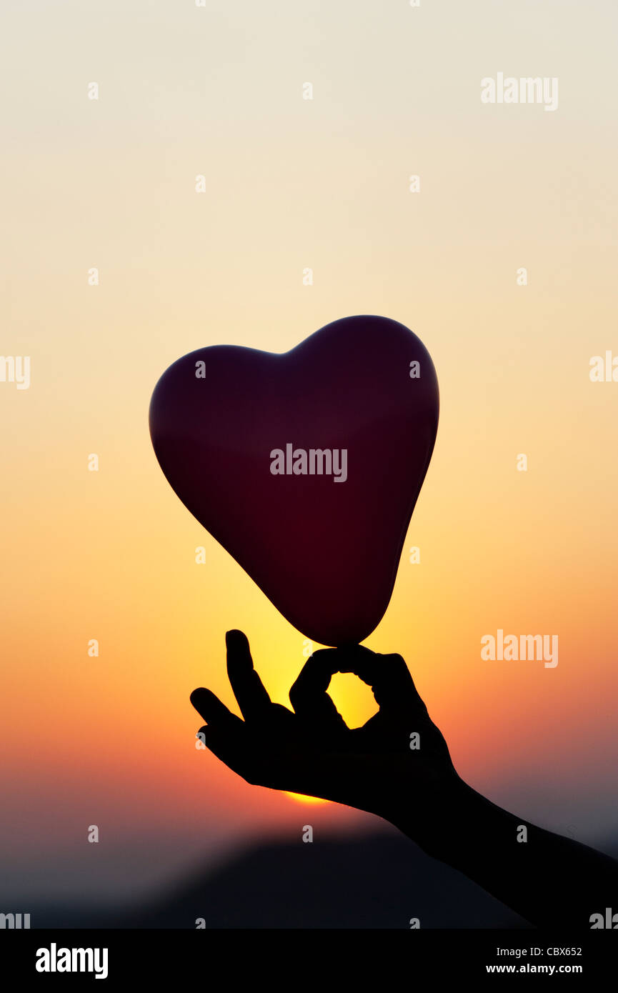 Heart hand symbol silhouette hi-res stock photography and images - Alamy