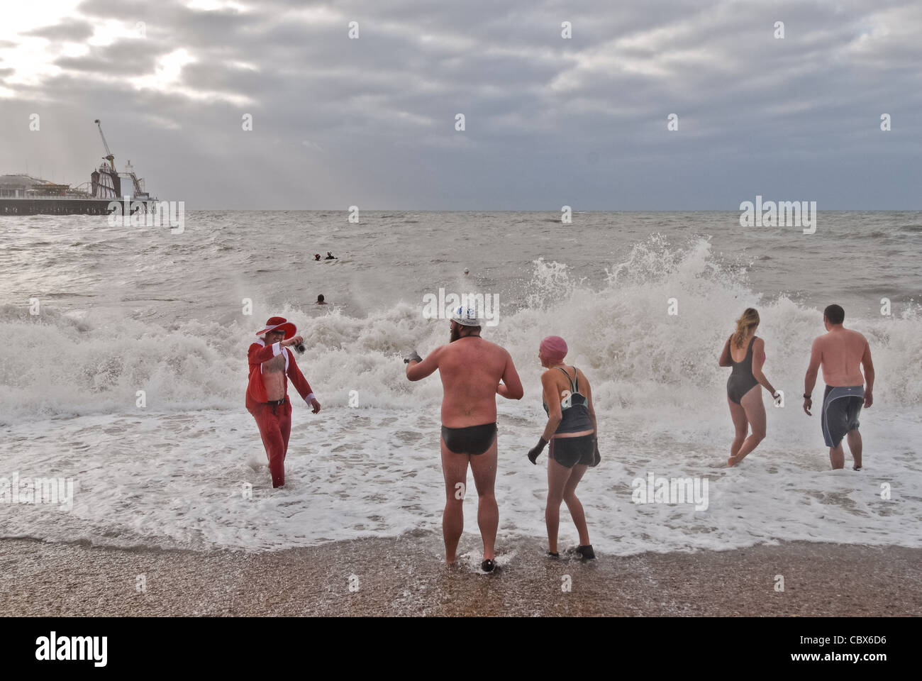 Swimmers in rough sea Stock Photo - Alamy