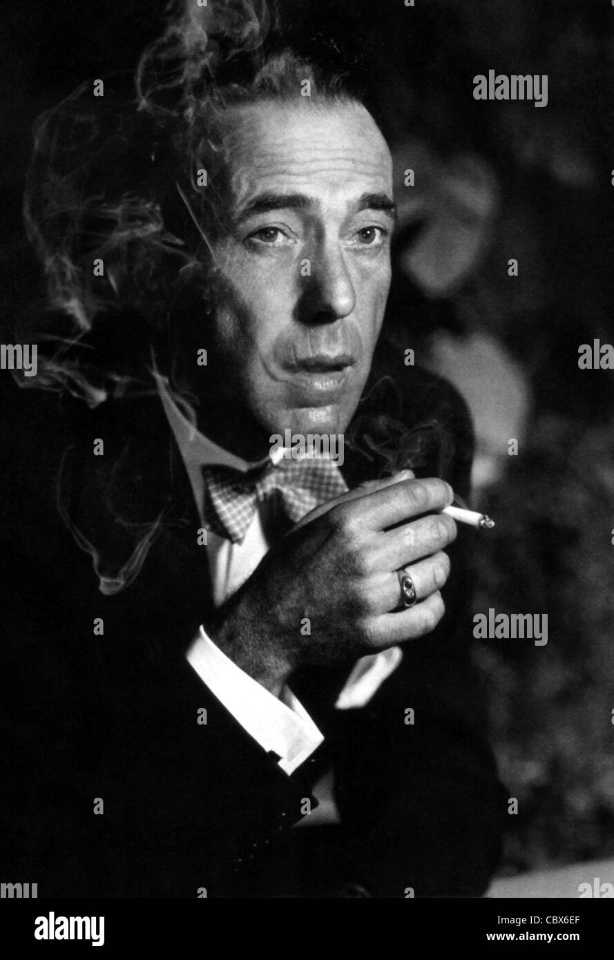 Humphrey Bogart portrait with cigarette Stock Photo - Alamy