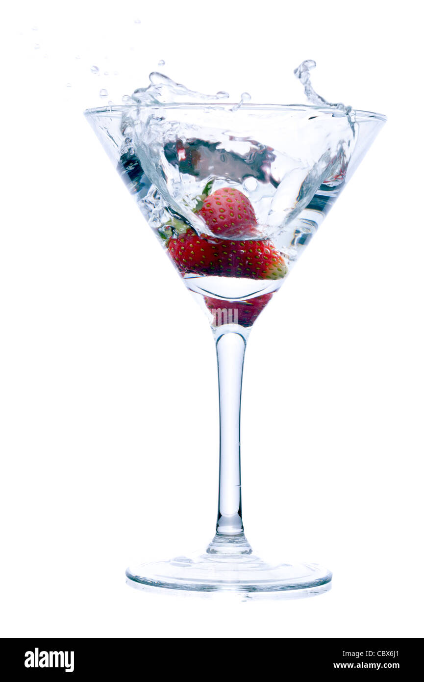 strawberry splash into drink Stock Photo - Alamy